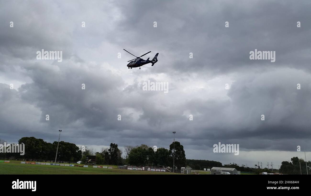 police helicopter taking off from football field Stock Photo - Alamy