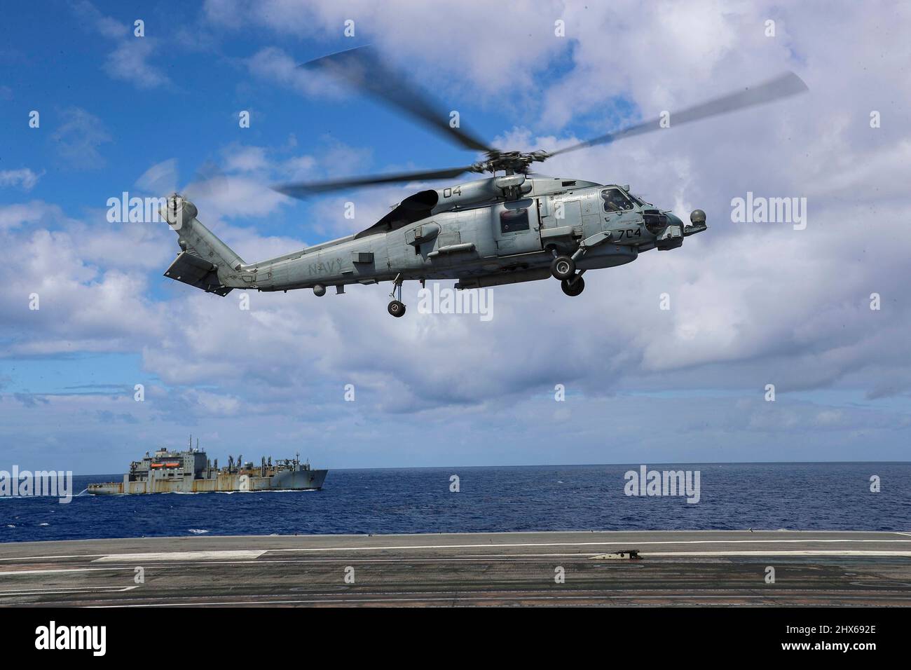 PHILIPPINE SEA (March 9, 2022) An MH-60R Sea Hawk helicopter, assigned ...