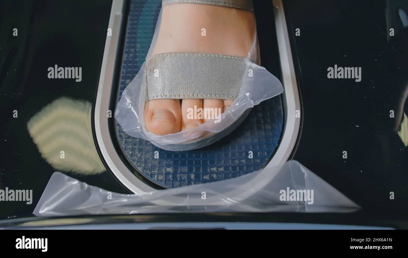 Automatic Thermal Shrinkable Shoe Cover Laminating Machine. Close up ...