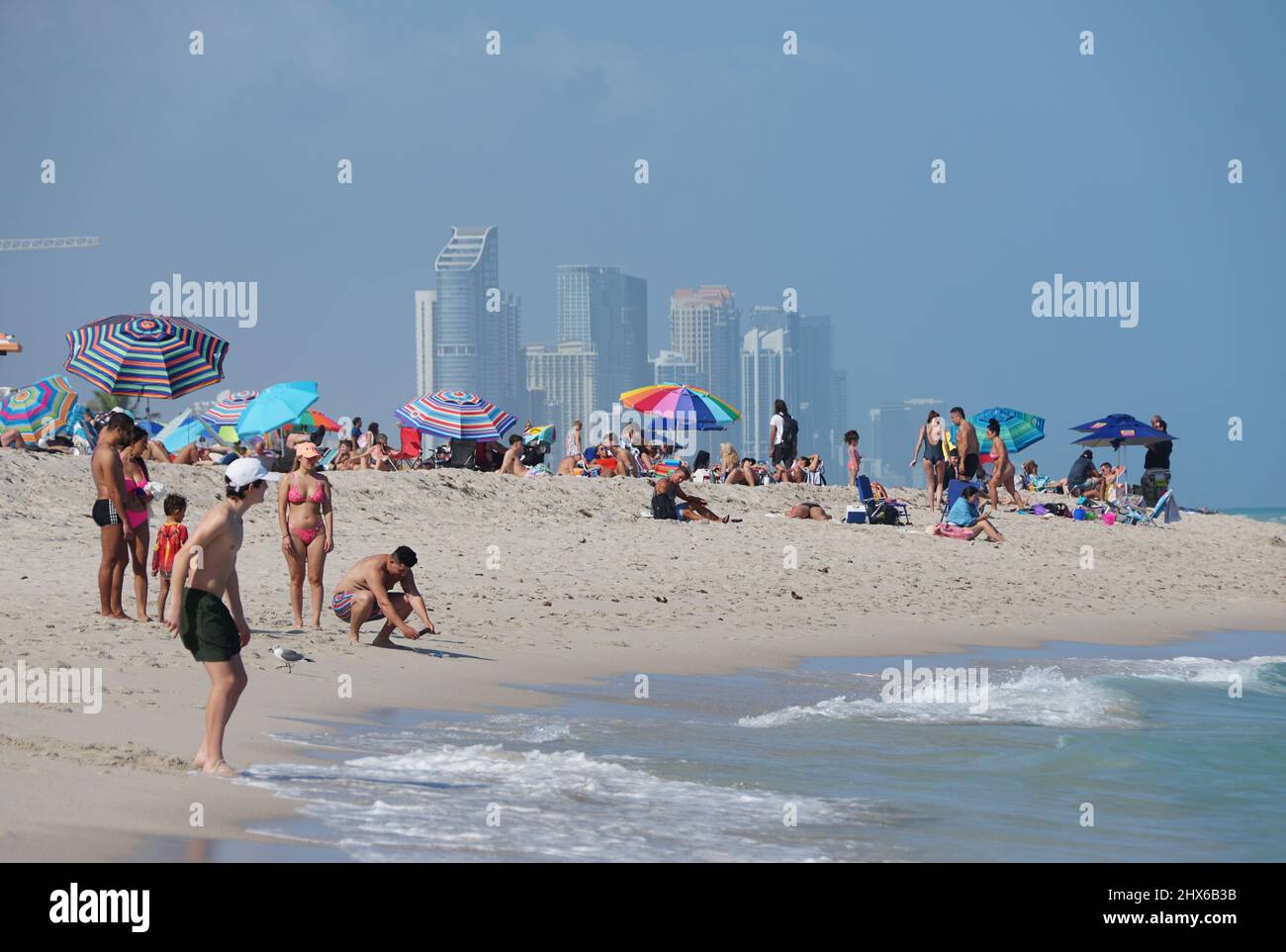 Miami Beach, Florida, U.S.A - February 18, 2022 - Visitors relaxing on ...