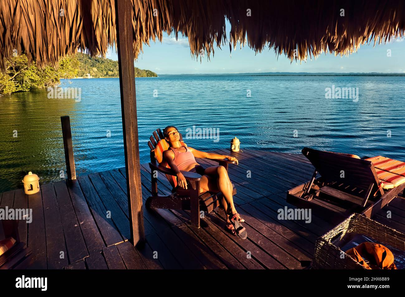 Relaxing on Lake Peten Itza, El Remate, Petén, Guatemala Stock Photo ...