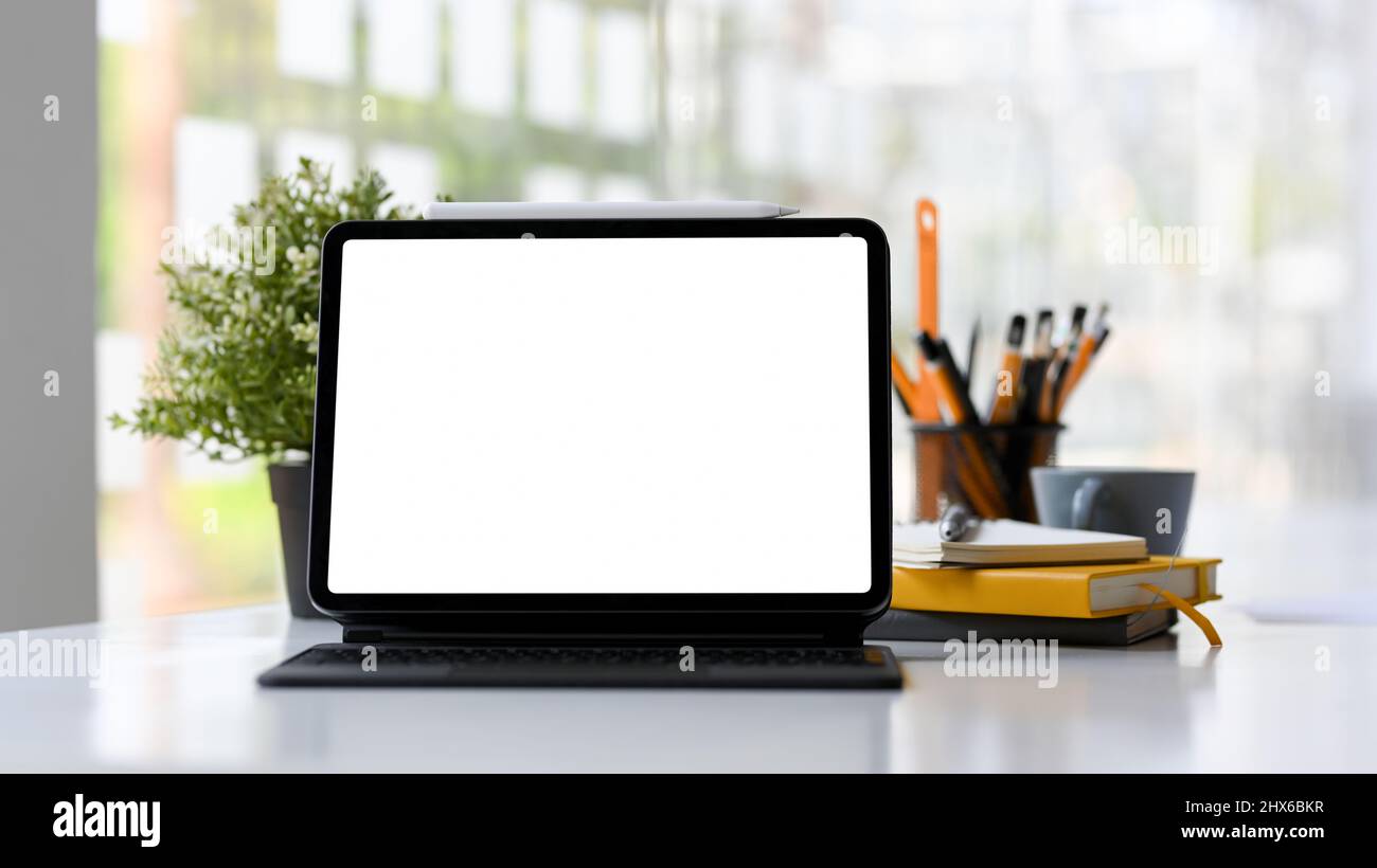 Digital tablet touchpad computer white screen mockup with wireless ...