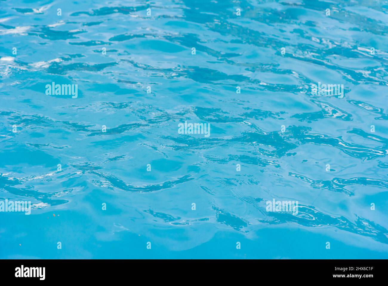 Pool Blue water reflection texture background Stock Photo - Alamy