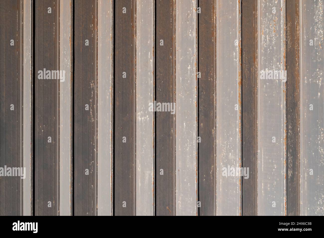 Abstract background texture of a rusty and weathered zigzag sliding ...