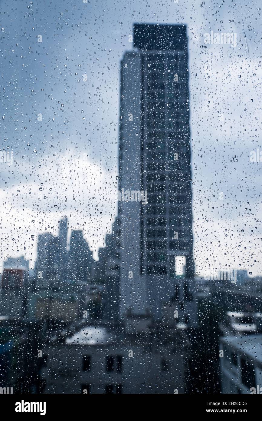 Abstract image of Rain drops on the dirty glass windows with modern ...