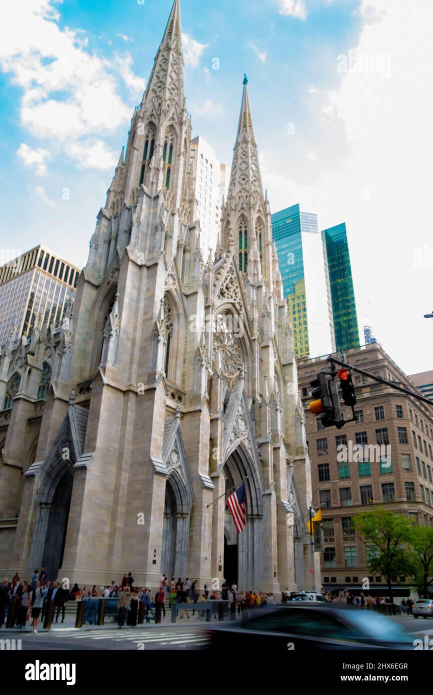 Gothic church surrounded by tall modern buildings Stock Photo - Alamy
