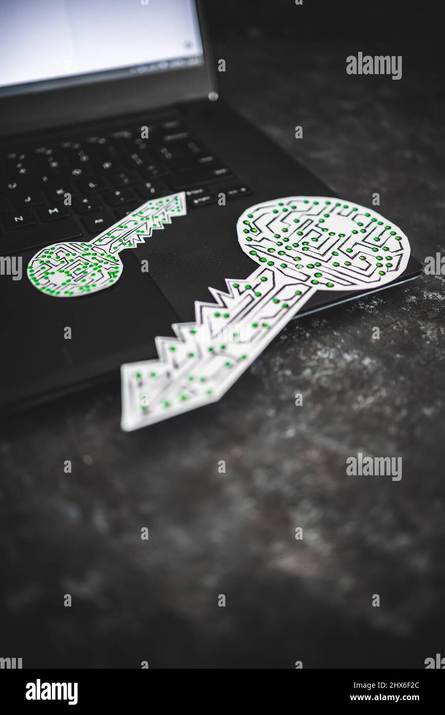 big and small encryption key icons made of circuits and LED lights on ...