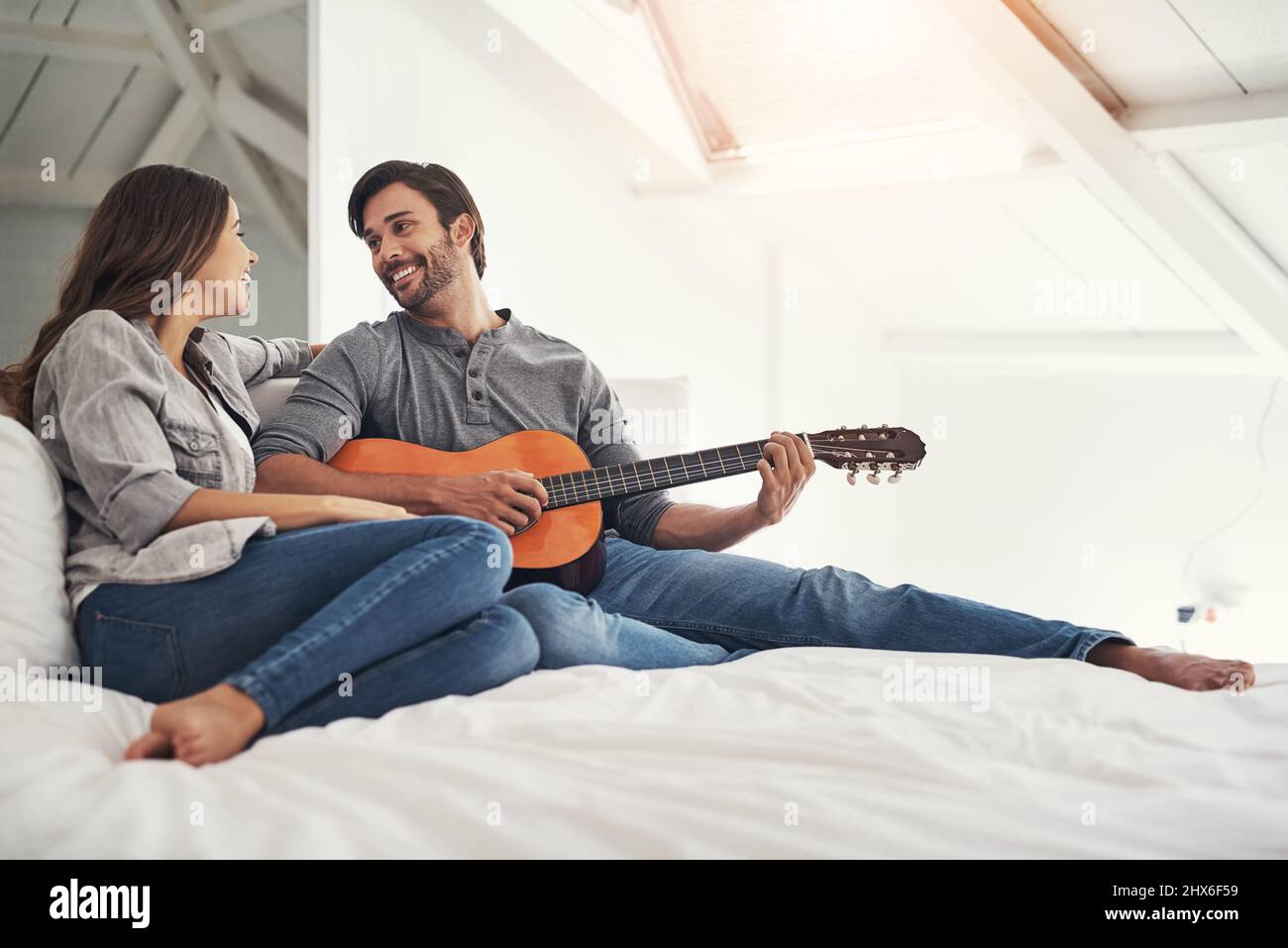Beautiful young couple home hi-res stock photography and images - Alamy