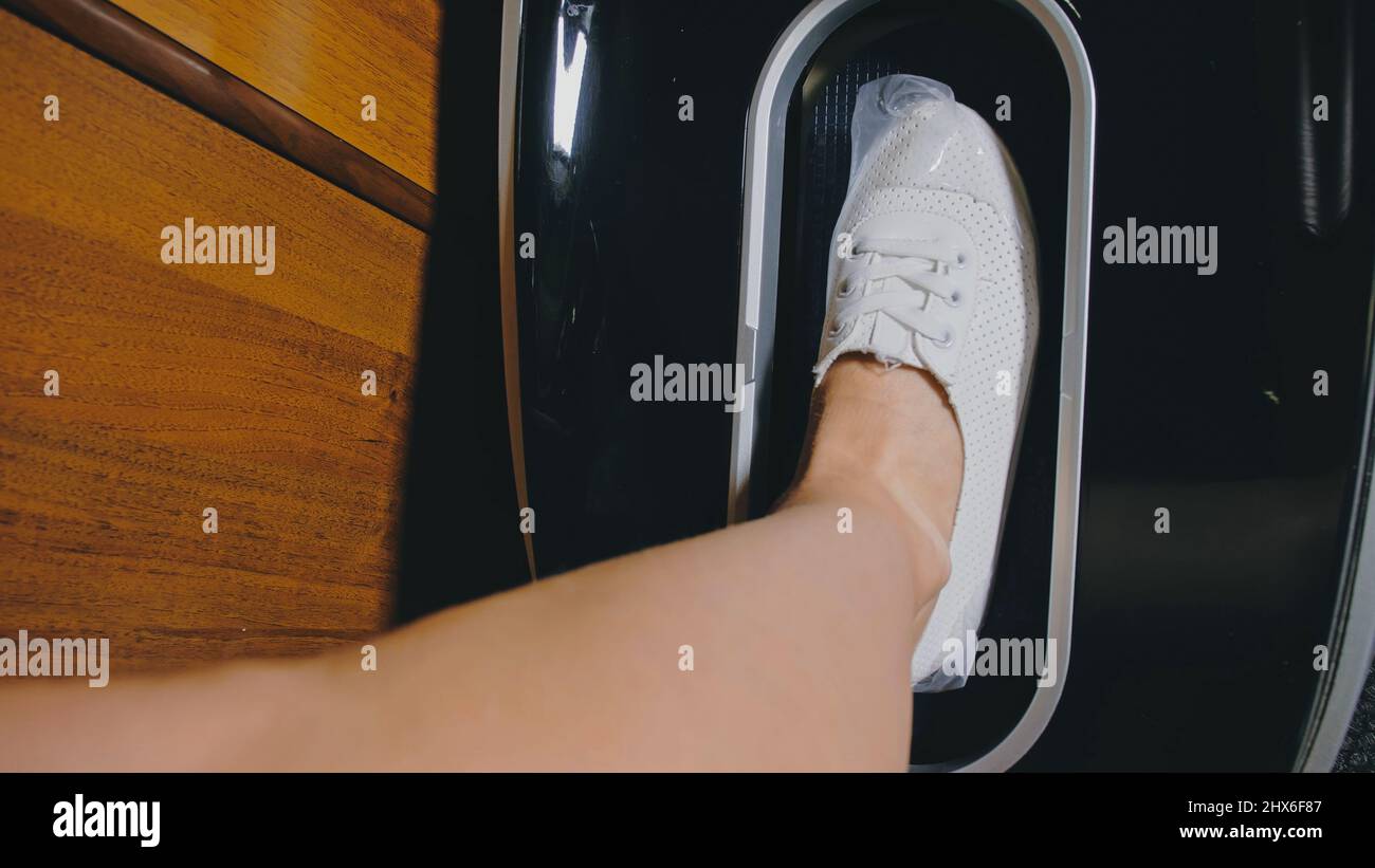 Automatic Thermal Shrinkable Shoe Cover Laminating Machine. Close up ...
