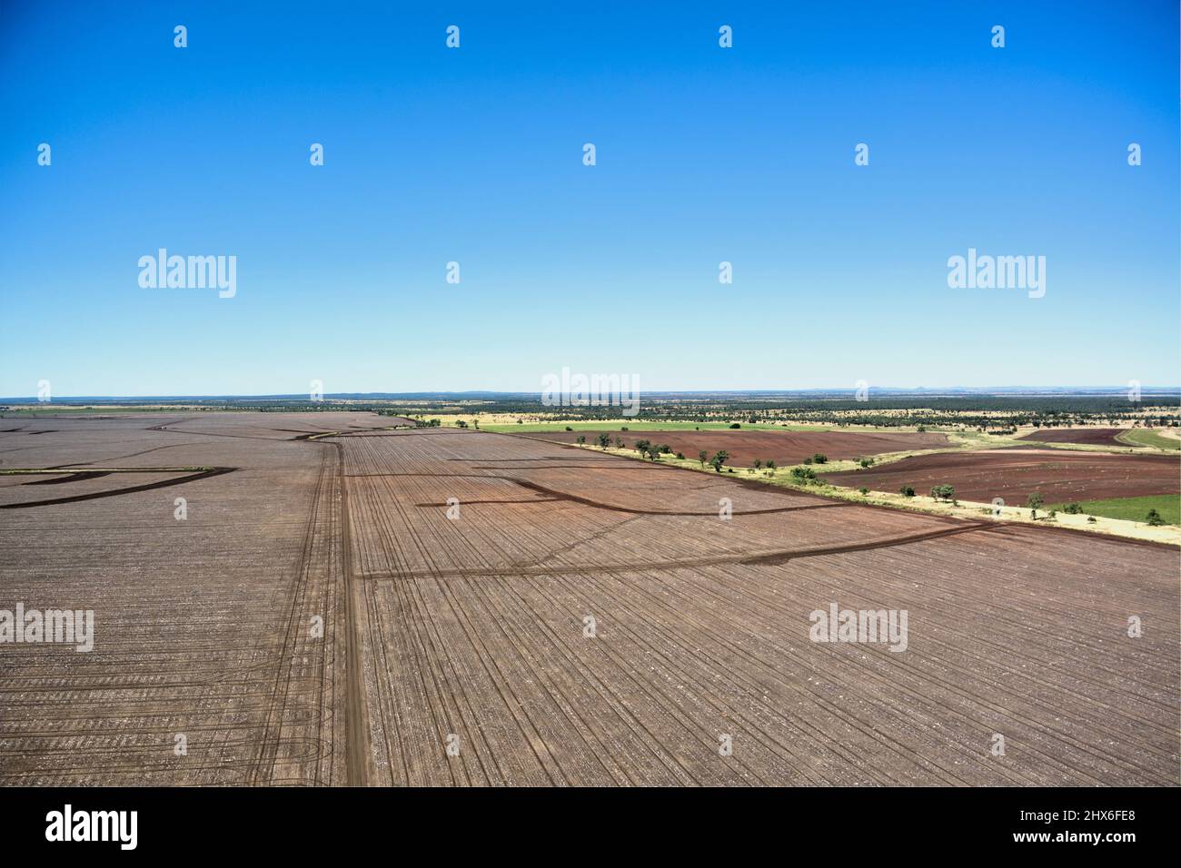 Aerial of ploughed ground ready for planting of broadacre sorgum crop ...