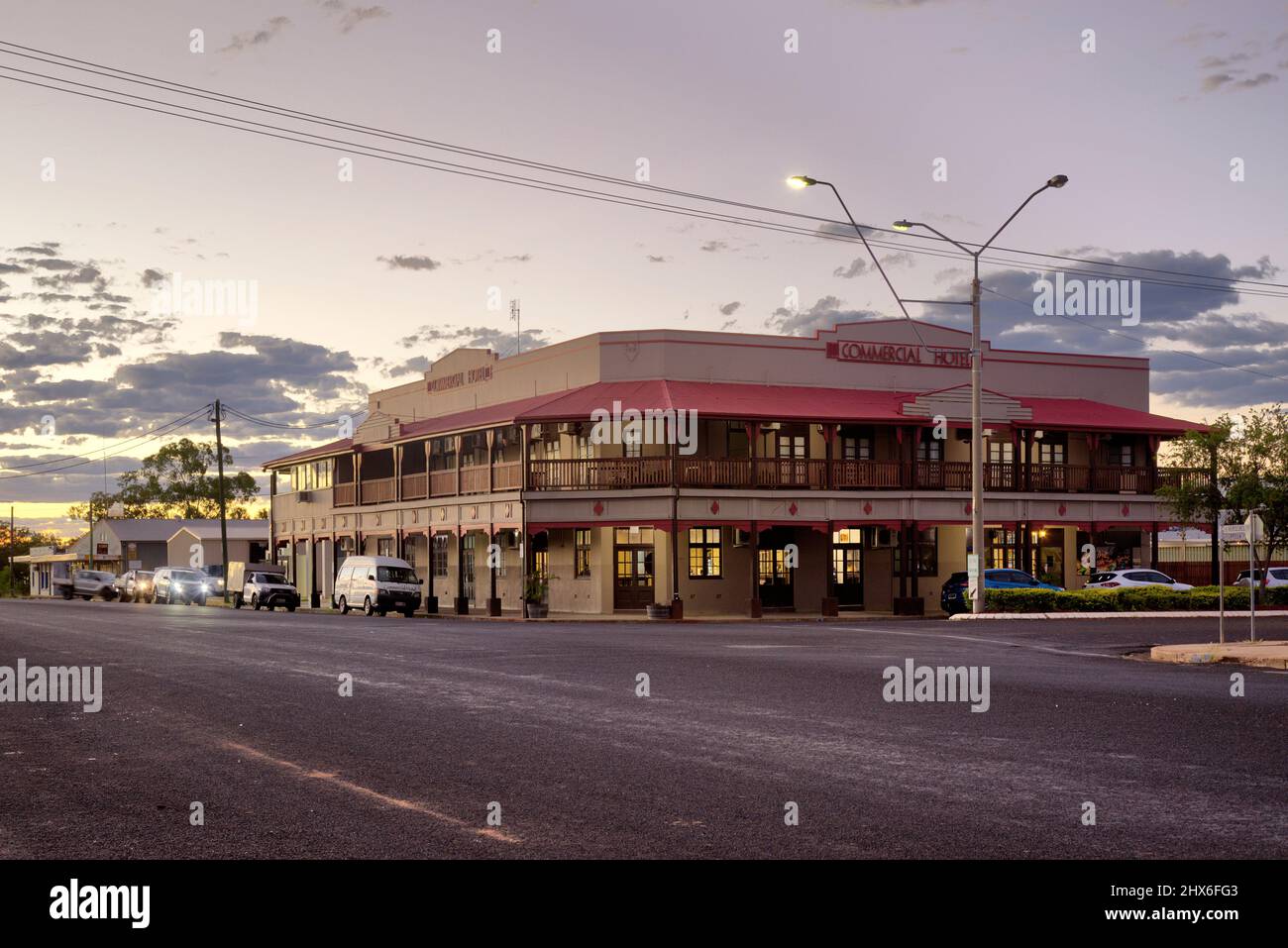 Twilight view of an old colonial building on a quiet street with clear ...