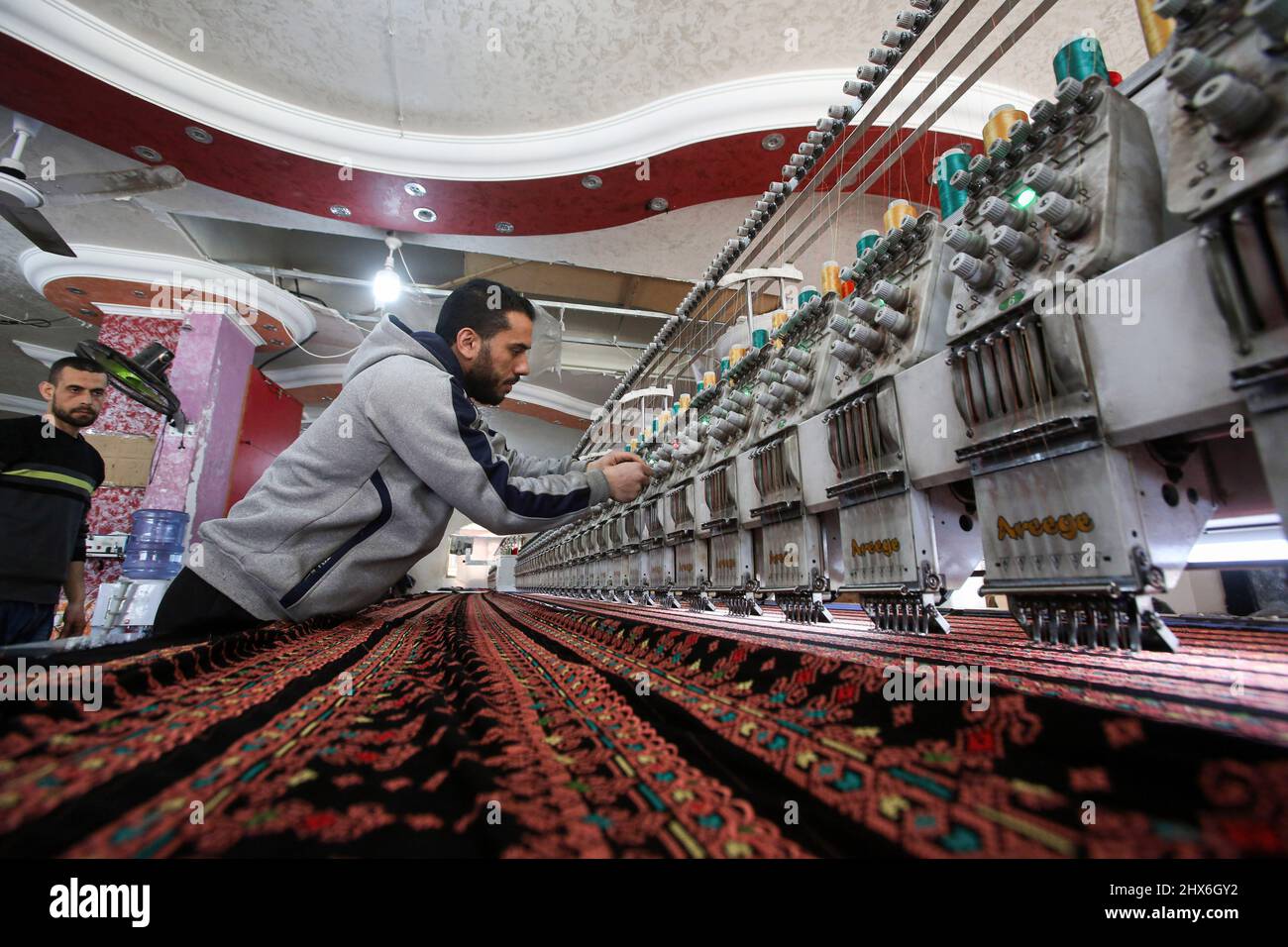Gaza, Palestine. 09th Mar, 2022. A Palestinian worker works on an ...