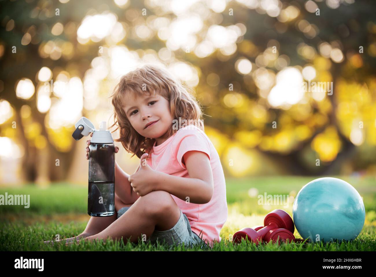 Happy kids sports exercises hi-res stock photography and images - Alamy
