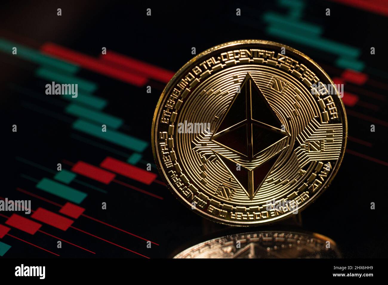 Ethereum coin token with candlestick chart background. Digital currency ...