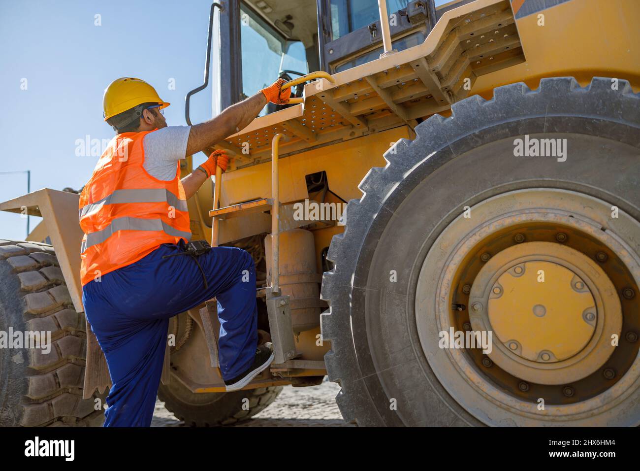 Experienced construction worker working hard at factory Stock Photo - Alamy