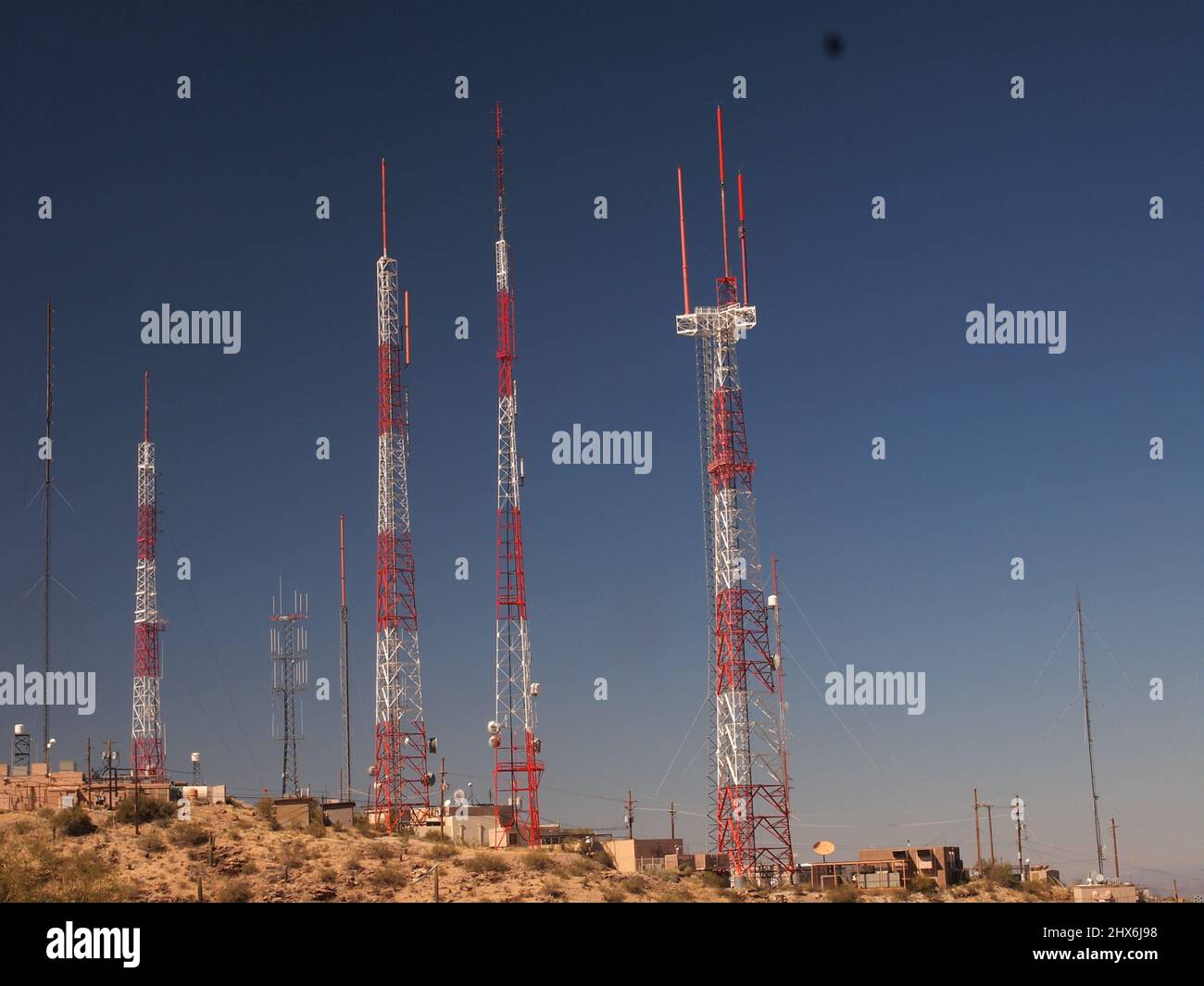 Eleven tall towers on an arizona mountain peak hi-res stock photography ...