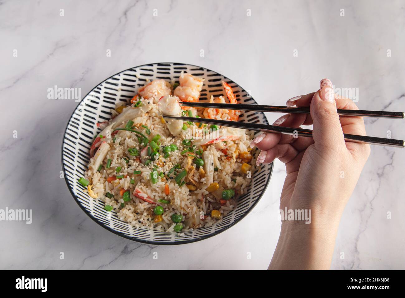 Woman eating pasta japanese hi-res stock photography and images - Alamy