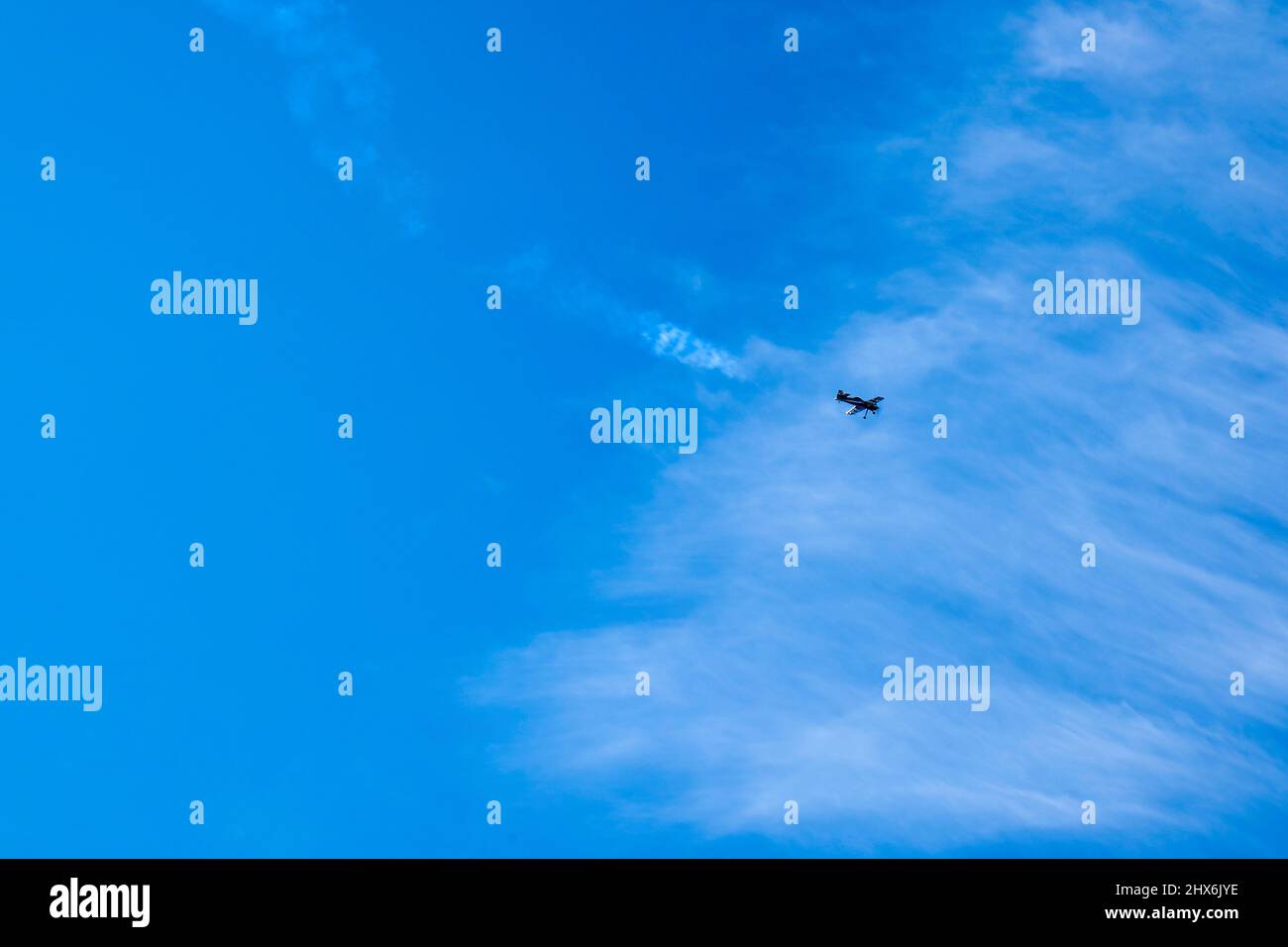 Overhead flying aircraft. Aircraft in formation during an aerobatics ...