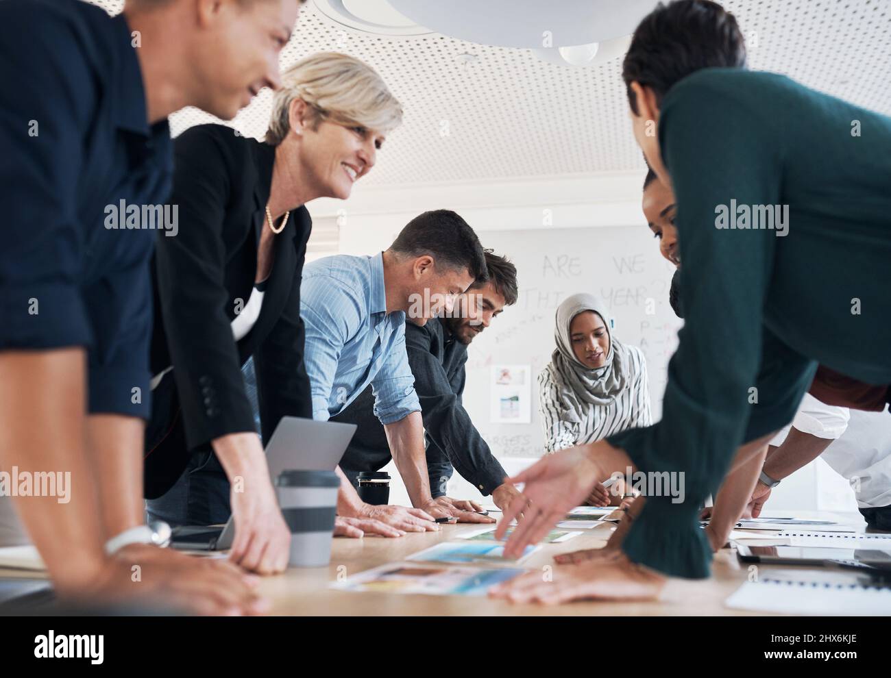 All the input they need to make it work. Shot of a group of ...