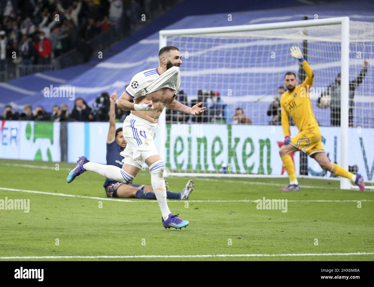 Karim Benzema of Real Madrid celebrates his goal while goalkeeper of ...