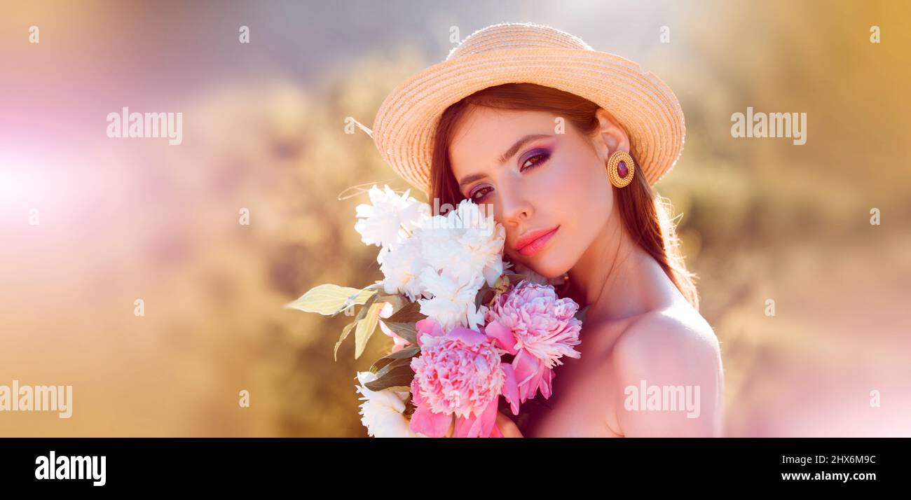 Outdoor fashion photo of beautiful young woman surrounded by spring ...