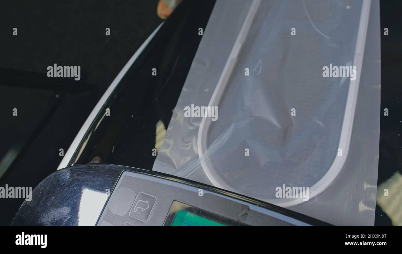 Automatic Thermal Shrinkable Shoe Cover Laminating Machine. Close up ...