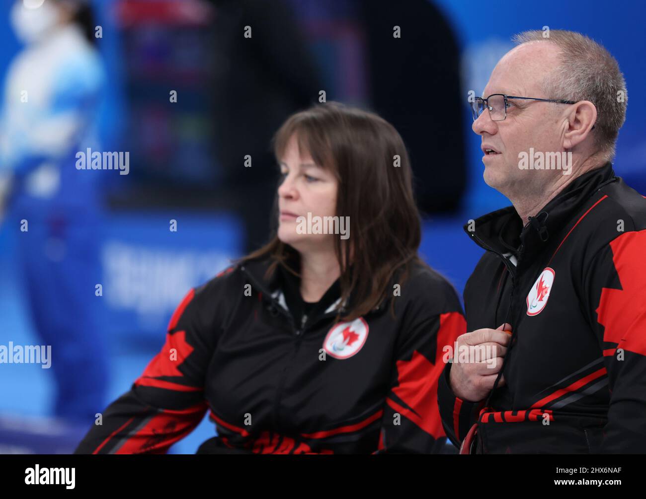 Beijing, China. 10th Mar, 2022. Dennis Thiessen (R) of Canada reacts ...
