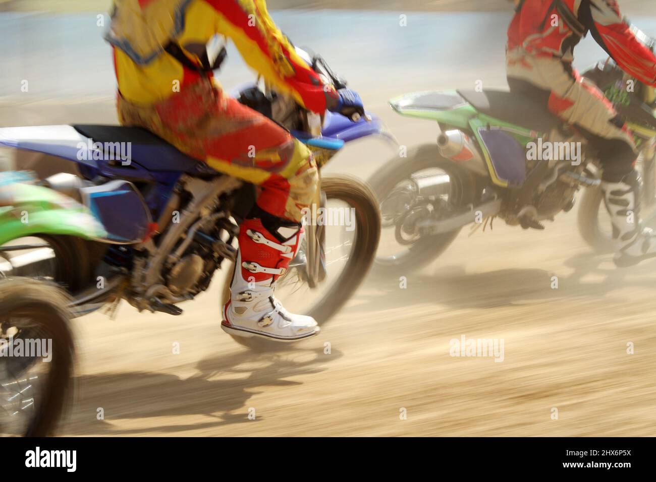motocross racer accelerating speed in track Stock Photo - Alamy