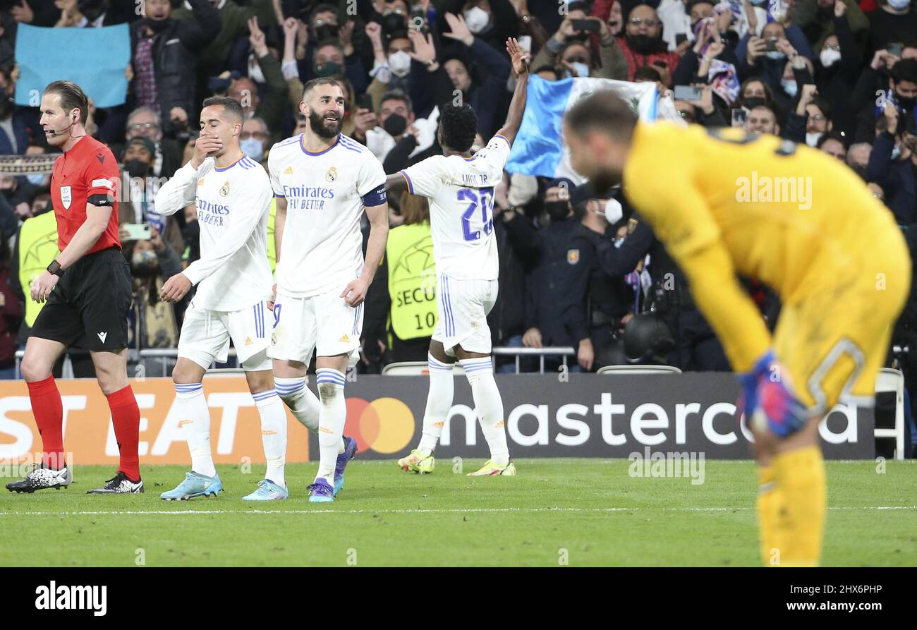 Karim Benzema of Real Madrid celebrates his third goal while goalkeeper ...