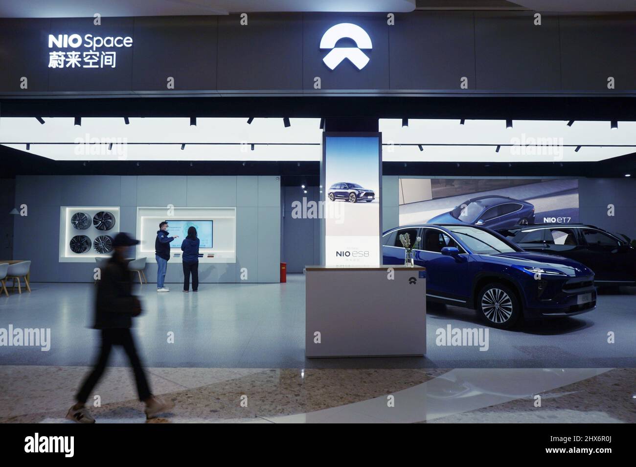 HANGZHOU, CHINA - MARCH 10, 2022 - A customer looks at an electric ...
