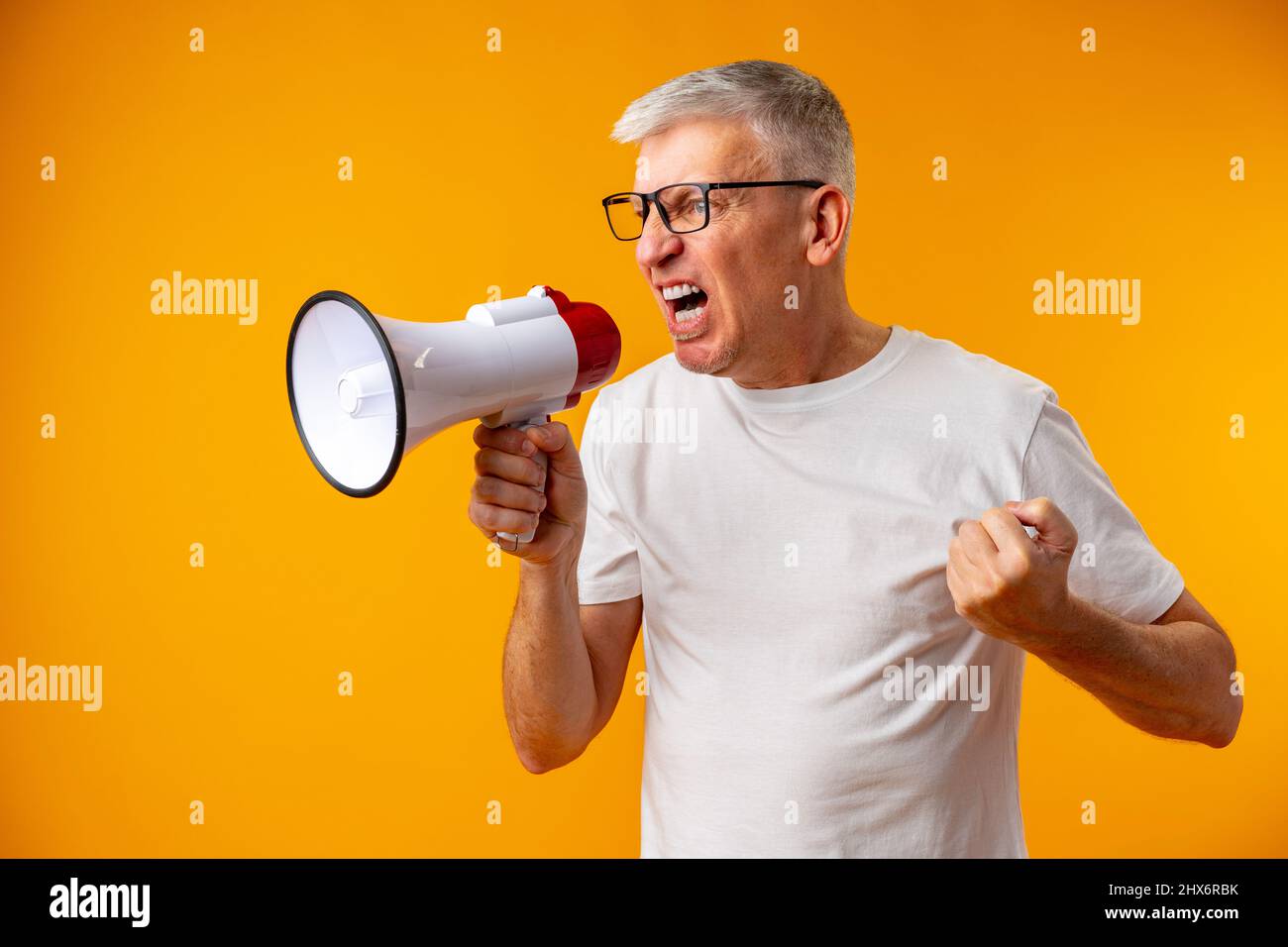 Person speaking bullhorn hi-res stock photography and images - Alamy