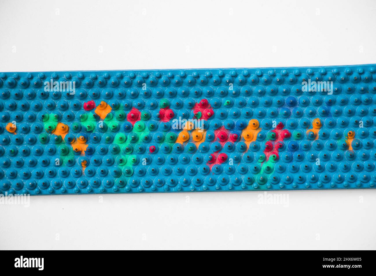 Lyapko mat on the white background, alternative medicine, high angle ...