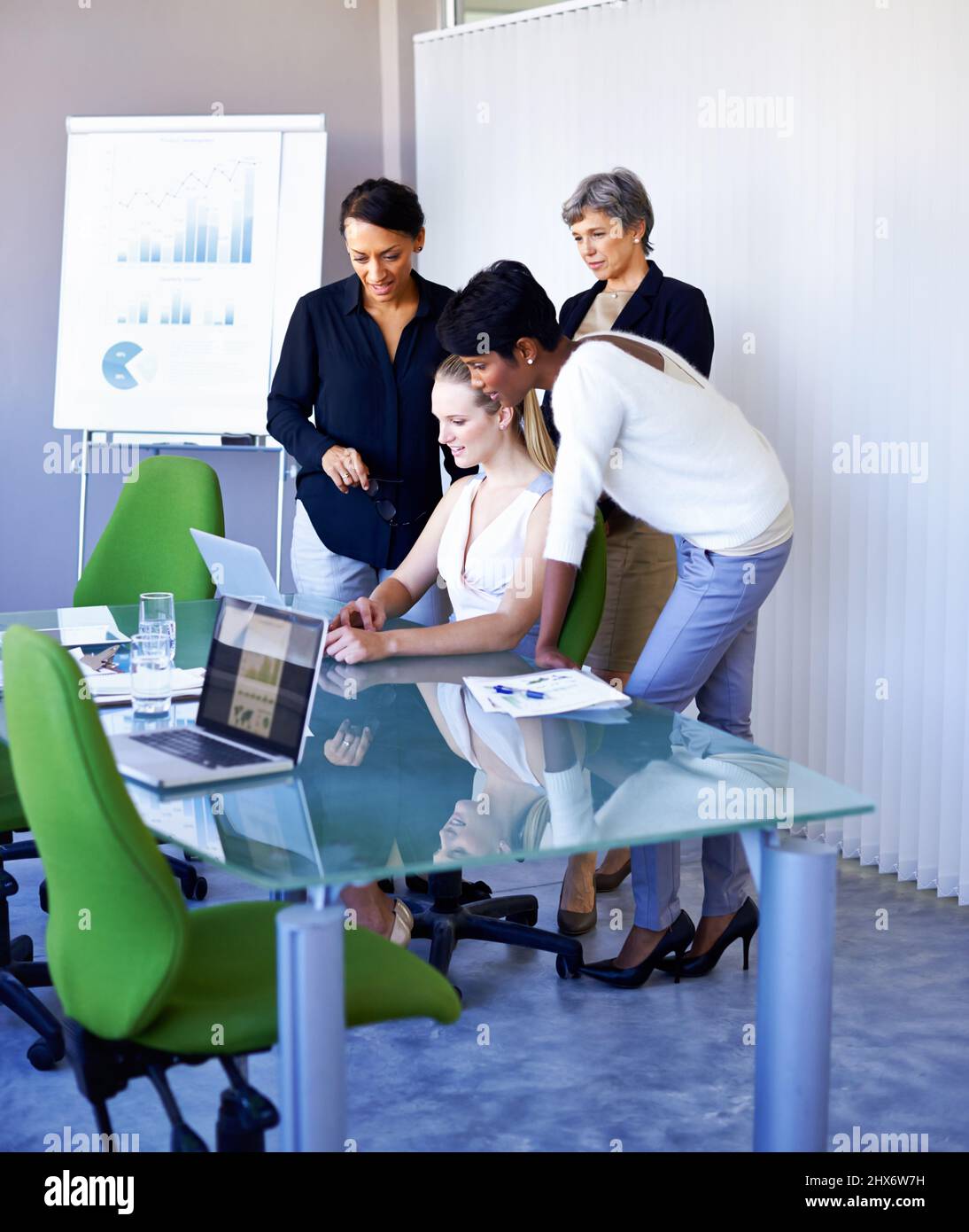 Getting the job done through teamwork. Shot of a group of coworkers ...