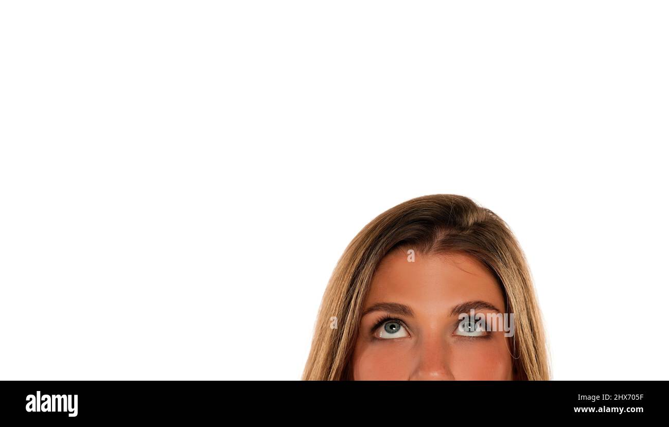 Half portrait of a beautiful woman with blue eyes looking up on a white ...