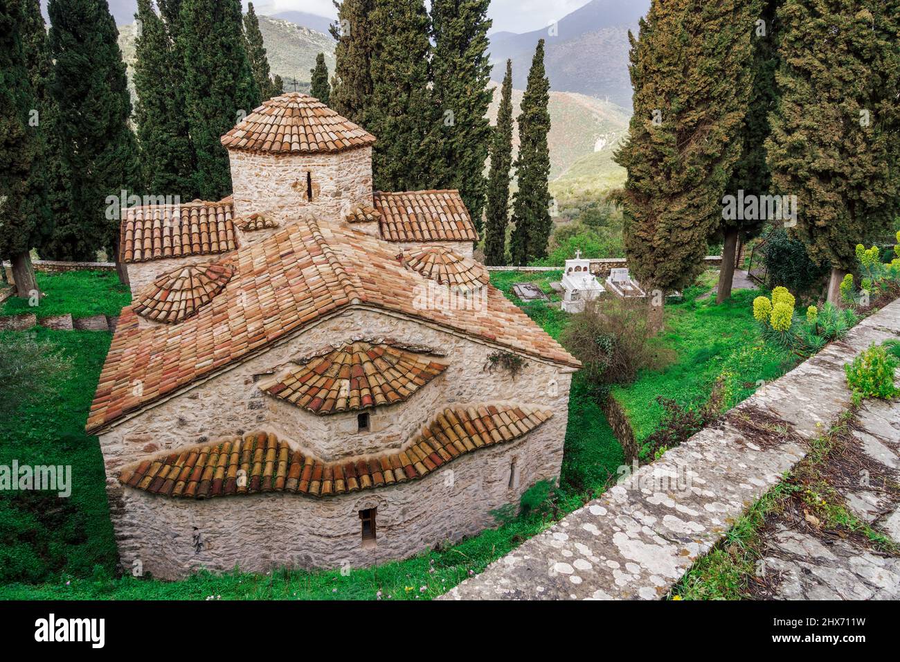 Greek Orthodox 11th century stone built church with cross above dome ...