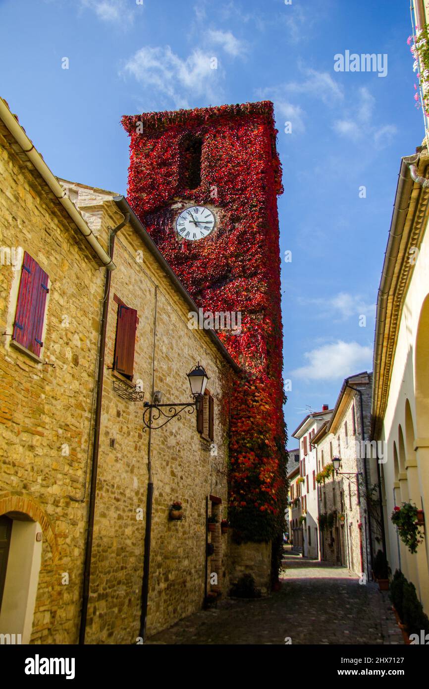Red clock tower, Frontino Stock Photo - Alamy