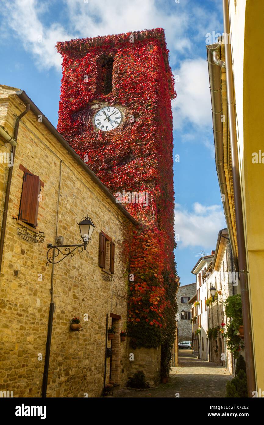 Red clock tower, Frontino Stock Photo - Alamy