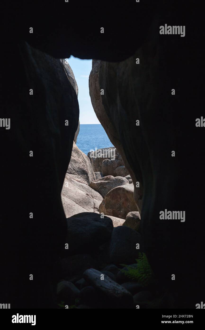 Cave at seaside Stock Photo - Alamy