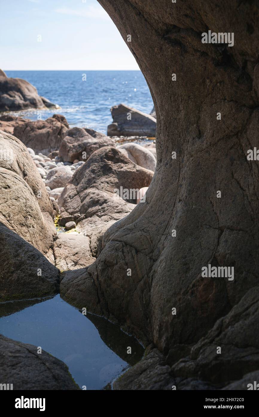 Cave at seaside Stock Photo - Alamy