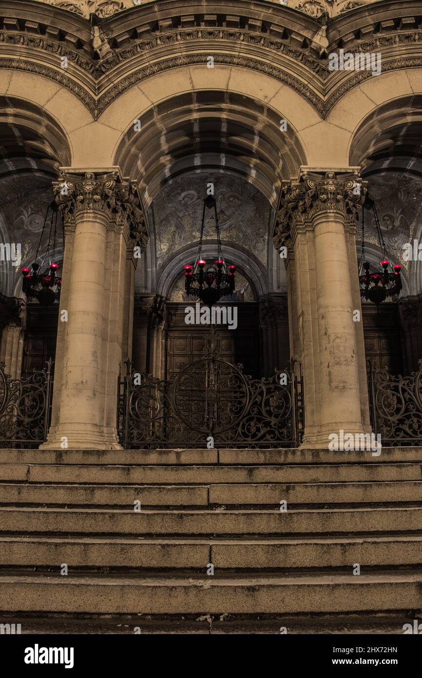 Big cathedral front gate at night Stock Photo - Alamy