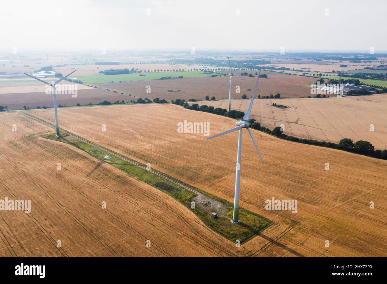 Wind turbines at field Stock Photo - Alamy