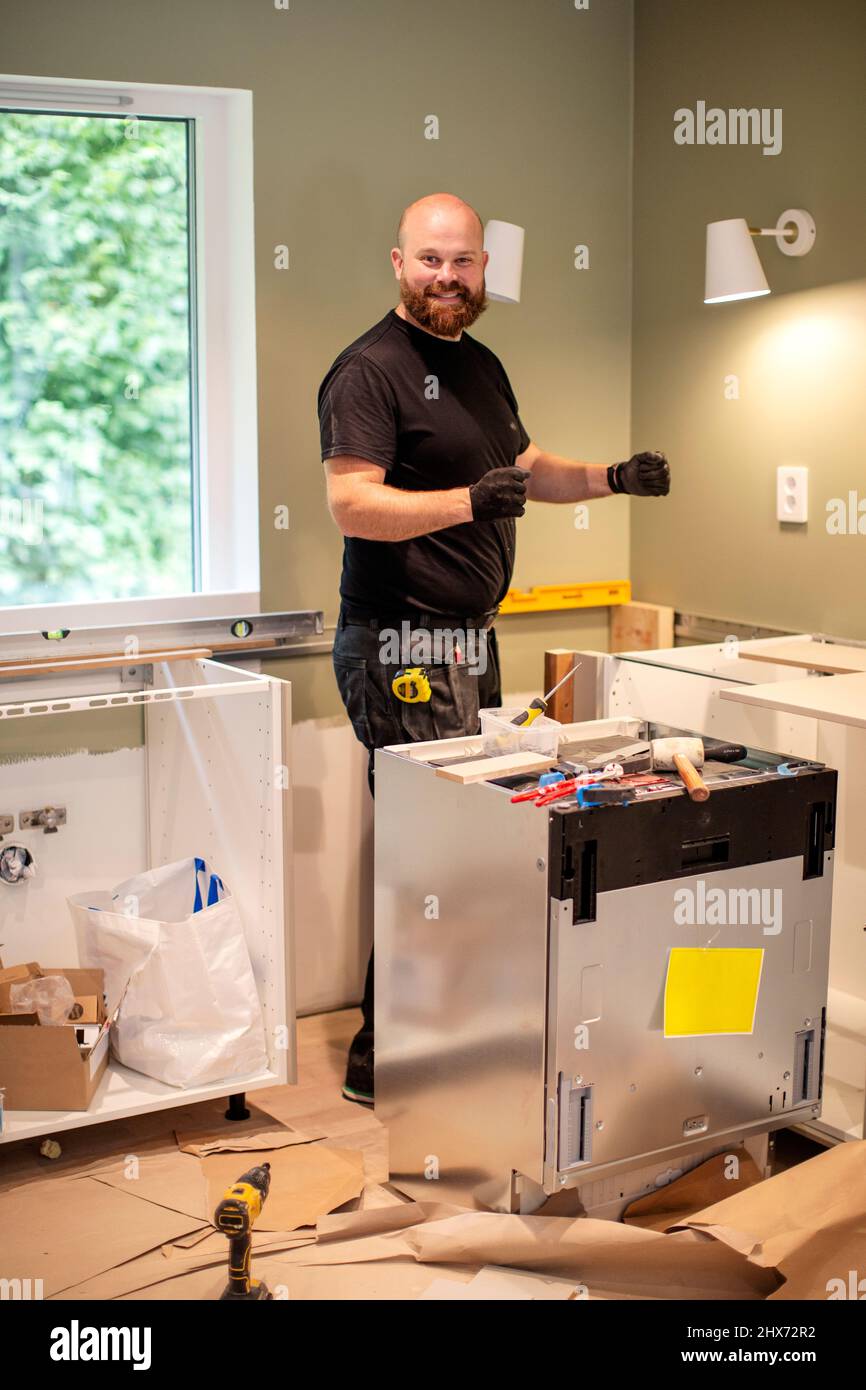 Man renovating kitchen home hi-res stock photography and images - Alamy