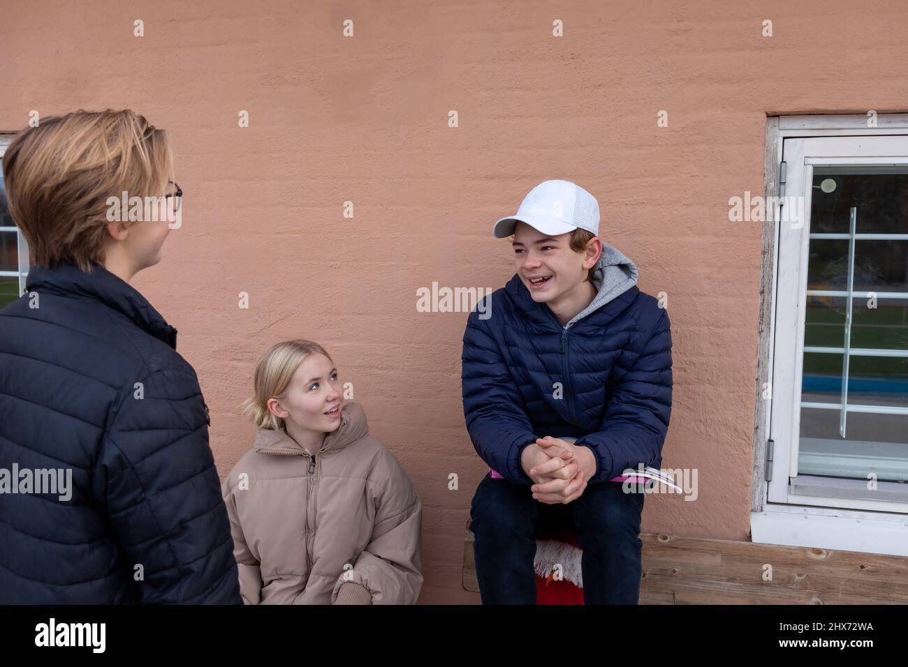 Group of school friends talking Stock Photo - Alamy