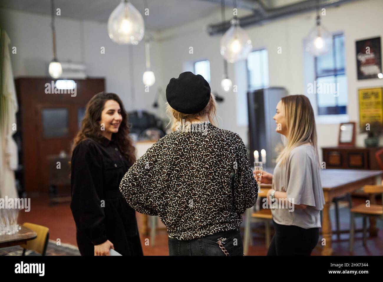 Women talking in cafe Stock Photo - Alamy