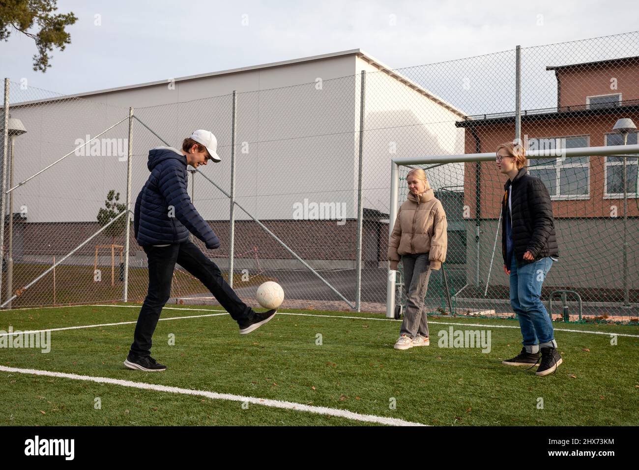 School children playing football school hi-res stock photography and ...