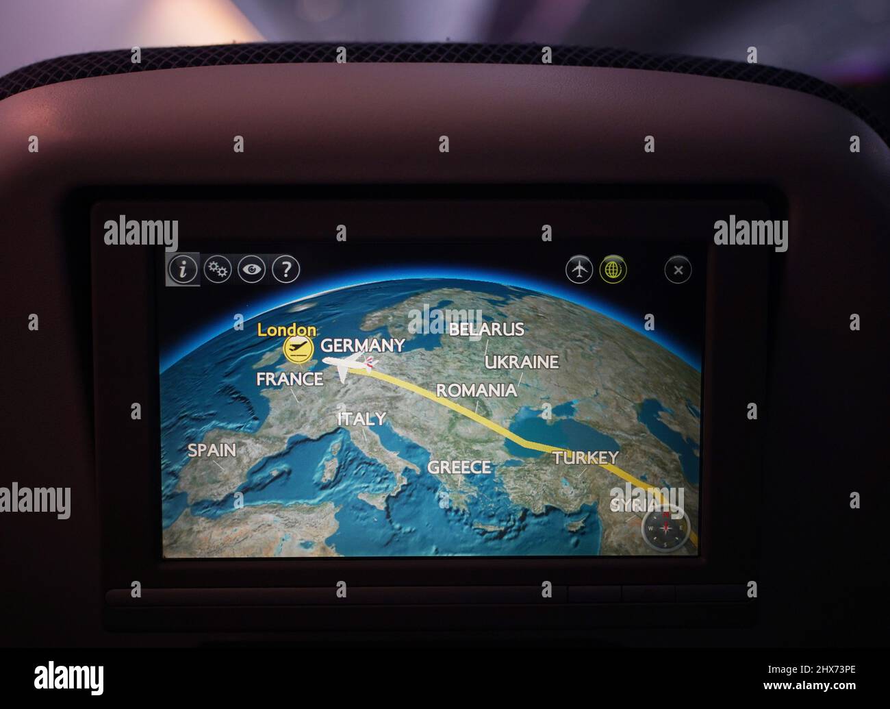 A passenger's in-flight entertainment screen showing the route on an ...