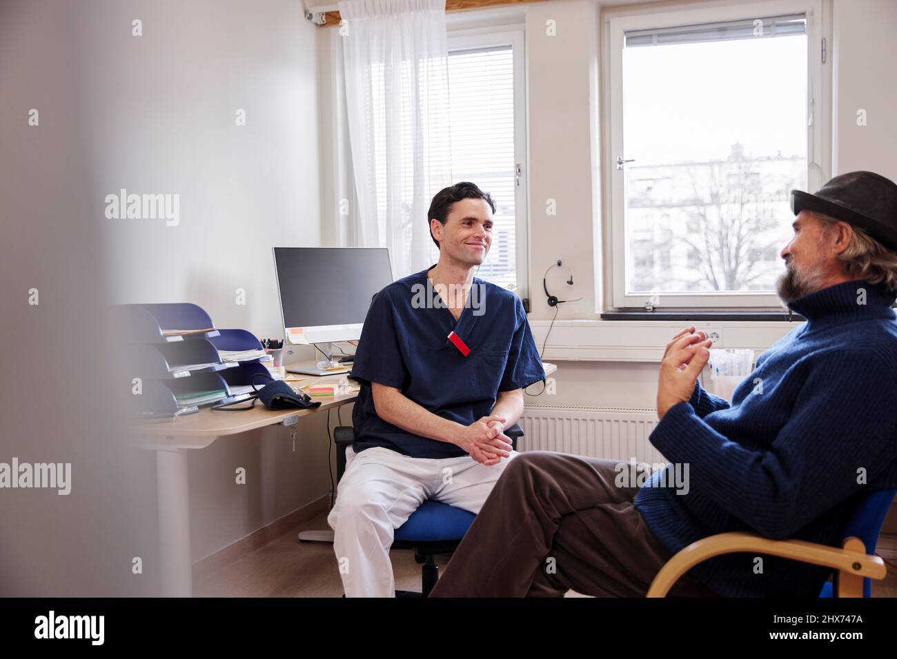 Senior man having doctor appointment Stock Photo - Alamy