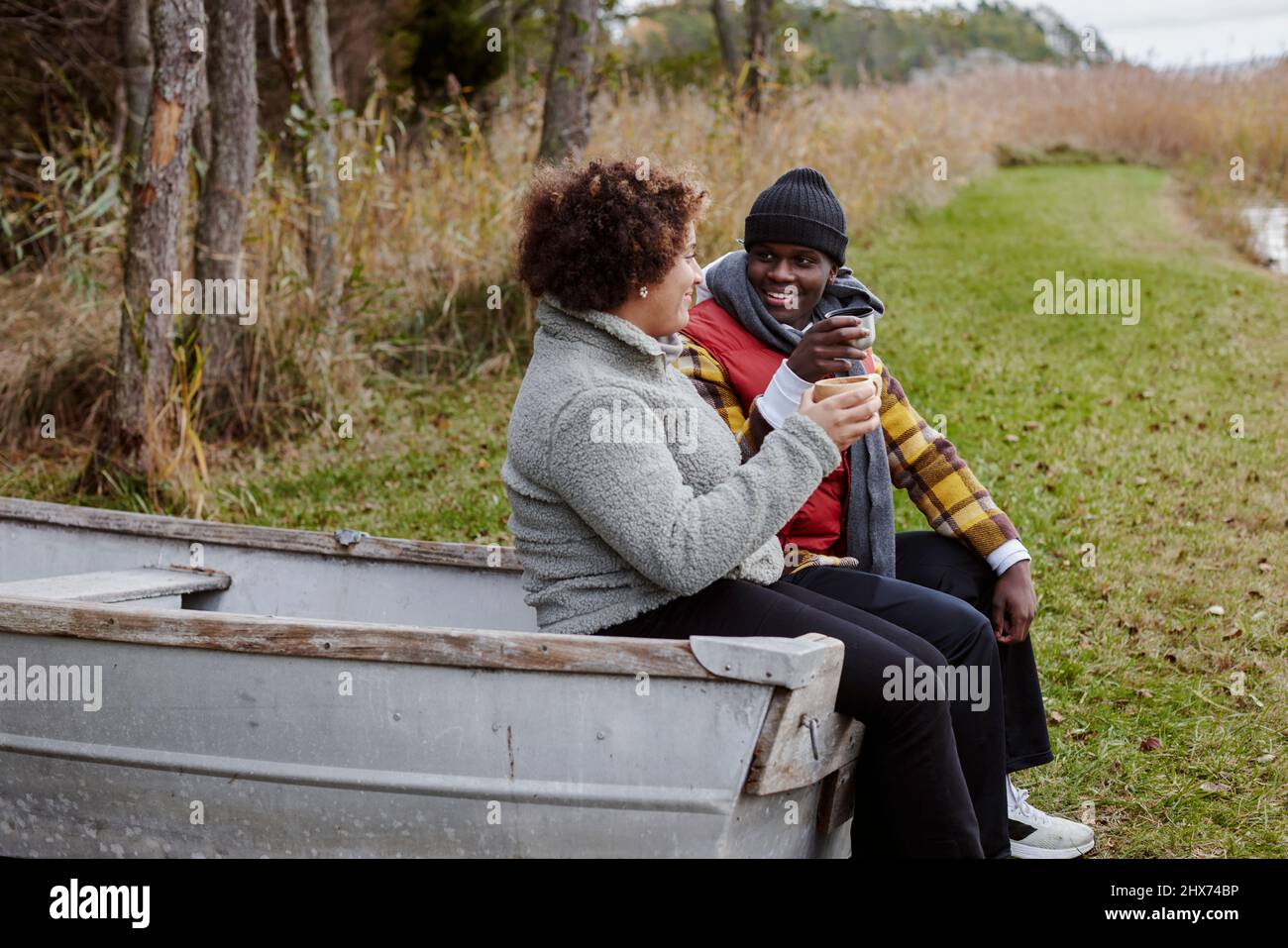 Young friends on boat hi-res stock photography and images - Alamy