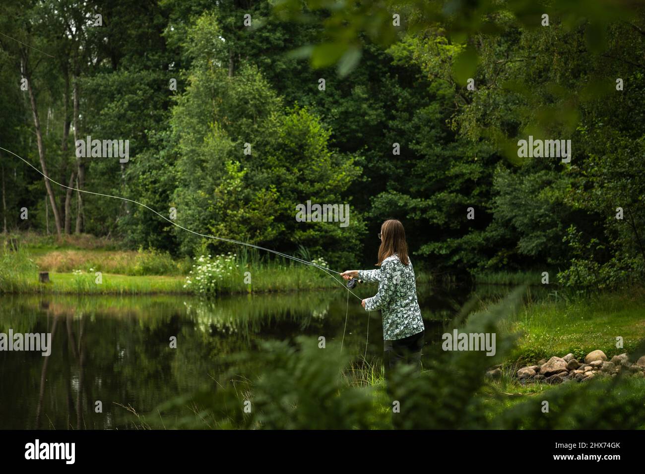 Recreational fishing man standing hi-res stock photography and images ...