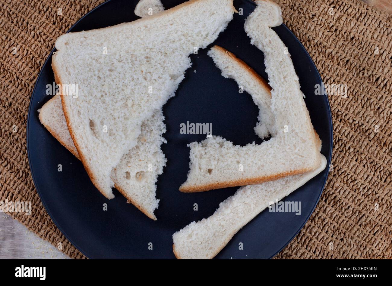 Crusts and crumbs of white bread slices as food security and shortages ...